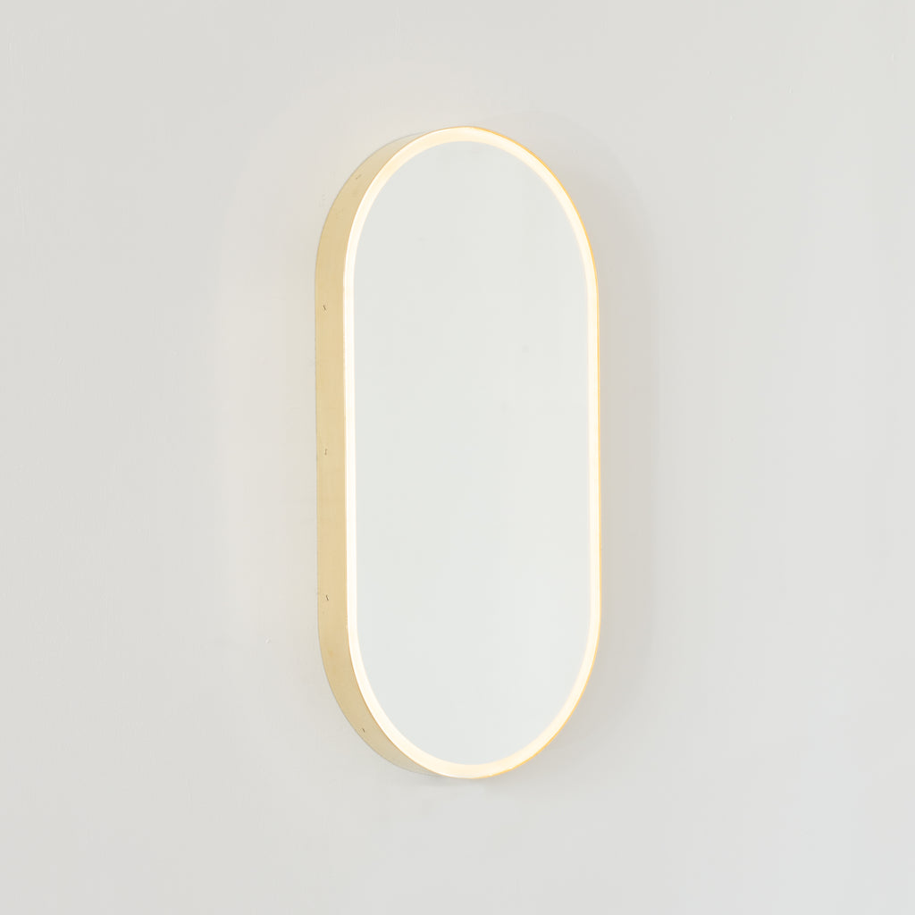 Capsula Illuminated Capsule shaped Mirror, Brass Frame, Customisable ...