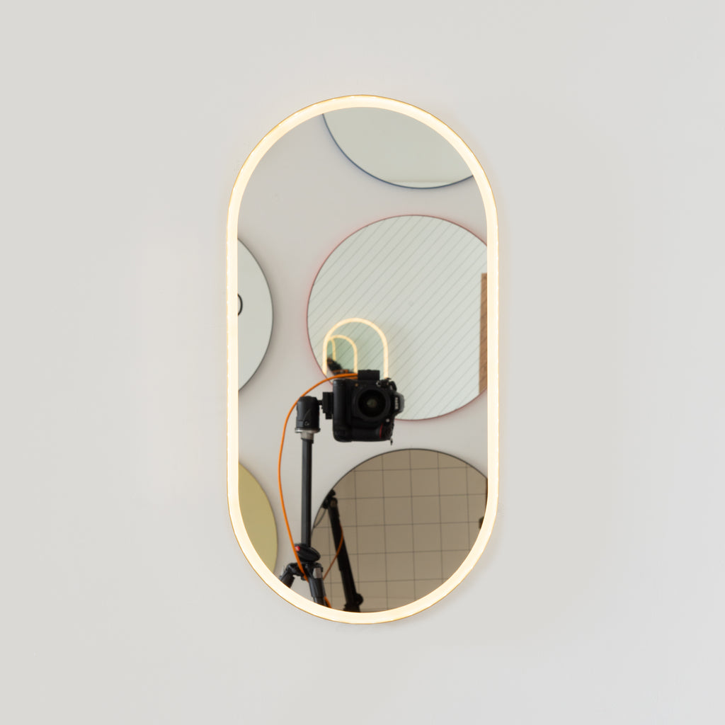 Capsula Illuminated Capsule shaped Mirror, Brass Frame, Customisable ...